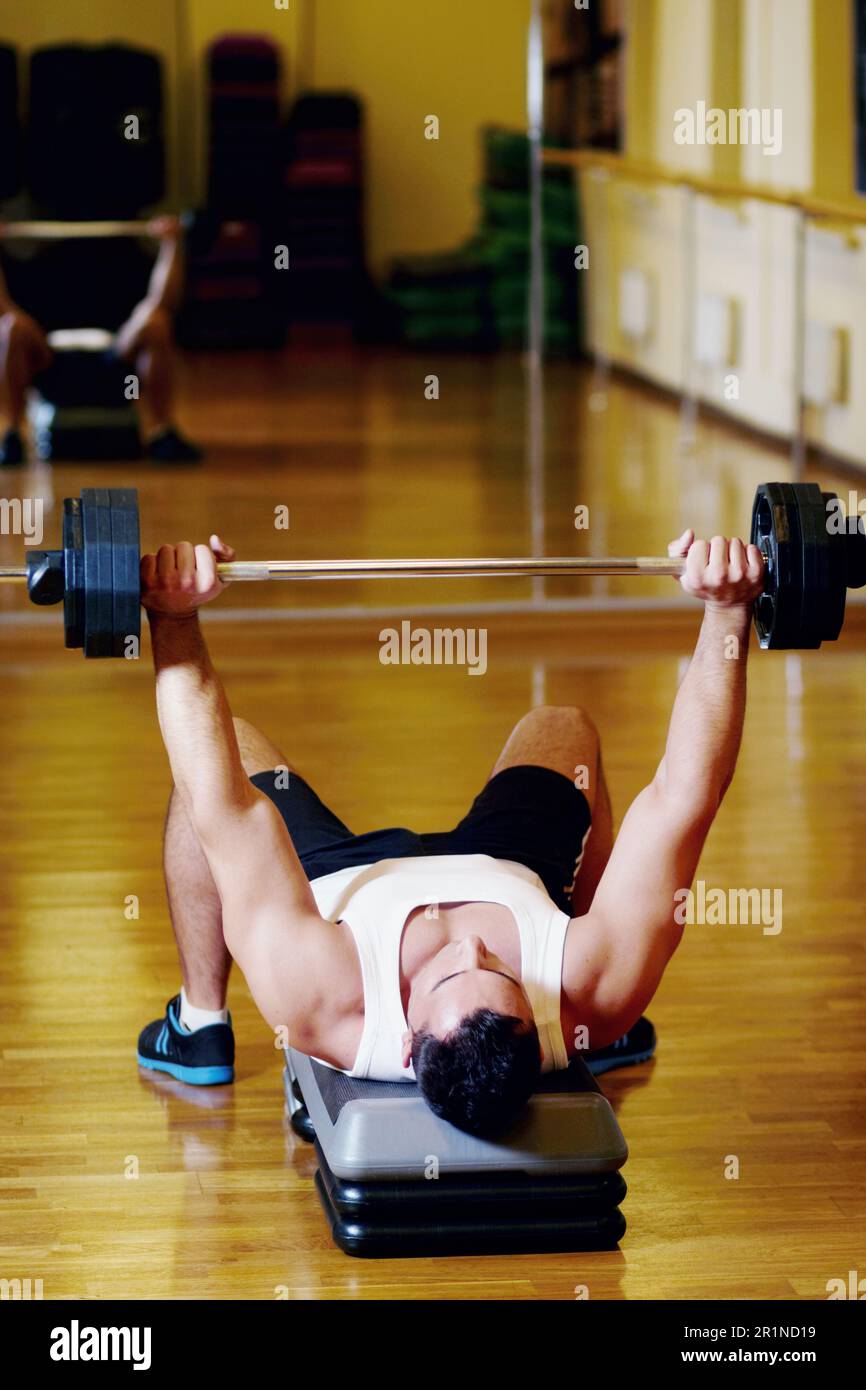 Barbell exercise, floor or man doing muscle workout, gym studio fitness ...