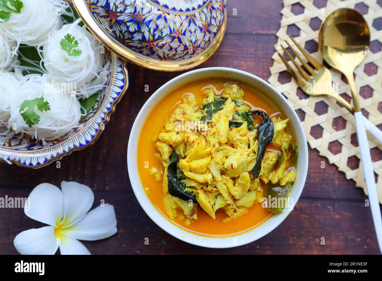 Thai Crab curry and betel leave in Benjarong porcelain with rice ...