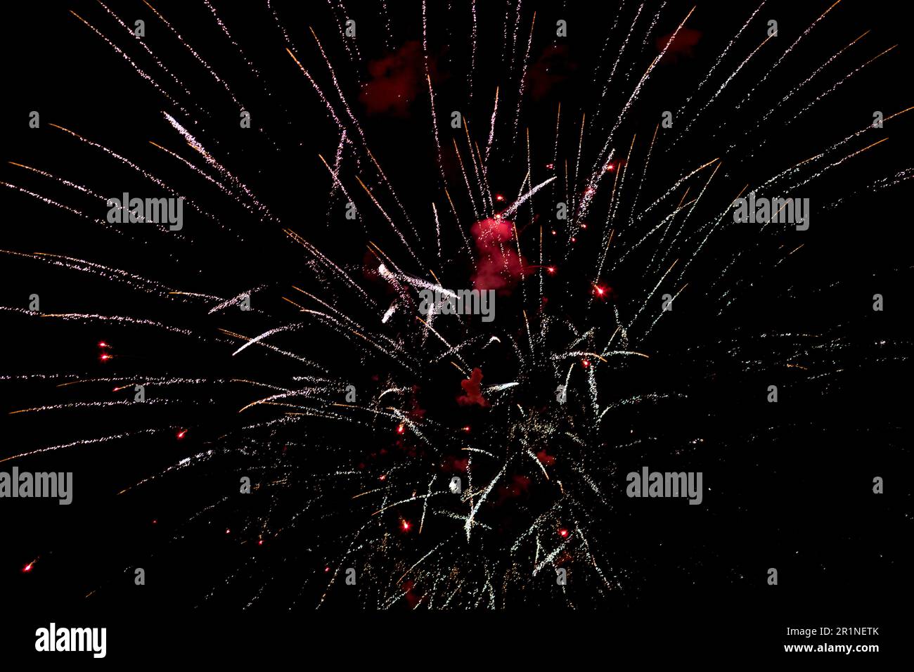 Huge fireworks explosions with vivid colors over a party Stock Photo ...