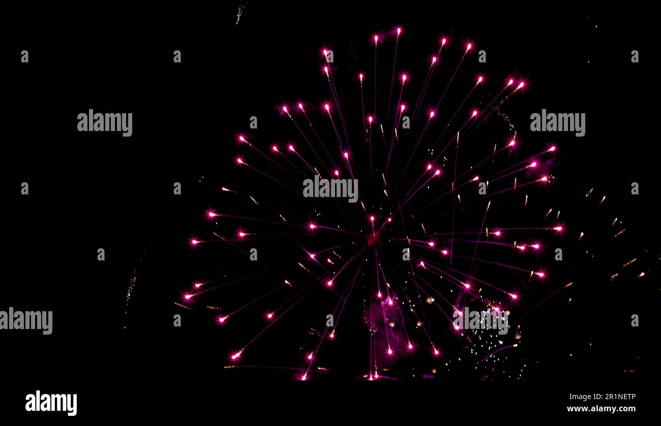Happy holiday fireworks in night sky. Exploding fireworks Stock Photo ...