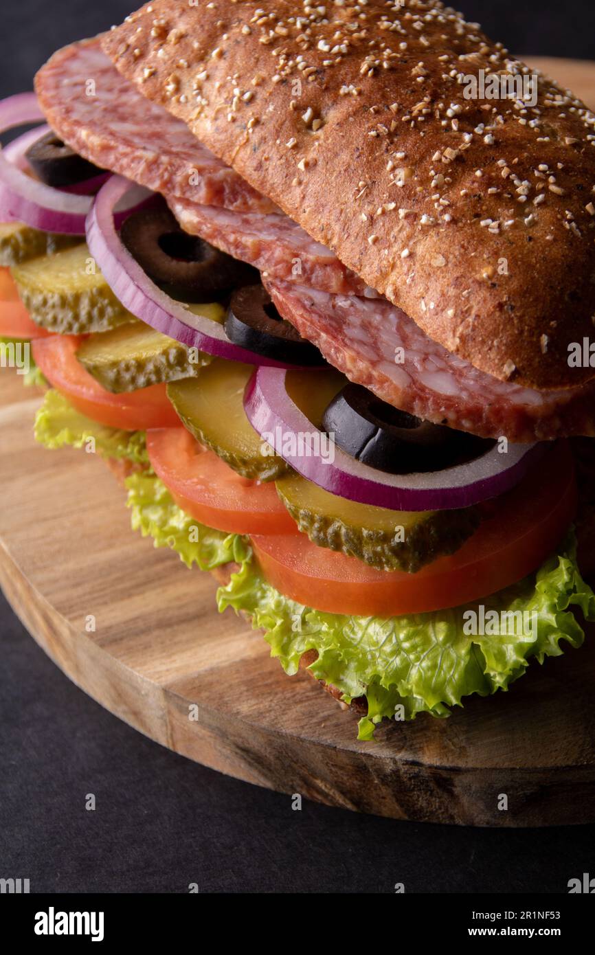 photo layered salami and vegetable sandwich top side view Stock Photo ...