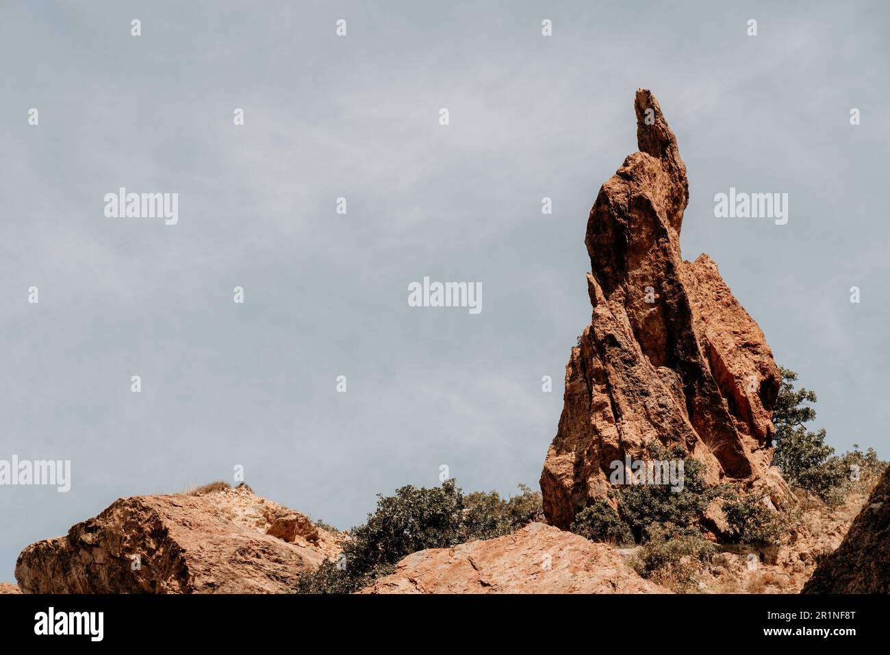 A close up of rocks that look like the beak of a bird or a sharp nose ...