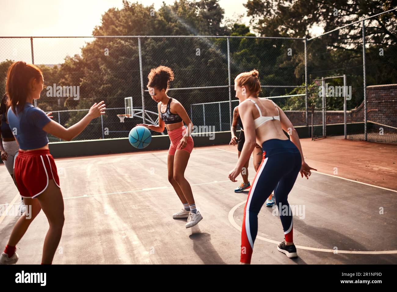 Adding the pressure. a diverse group of sportswomen playing a ...