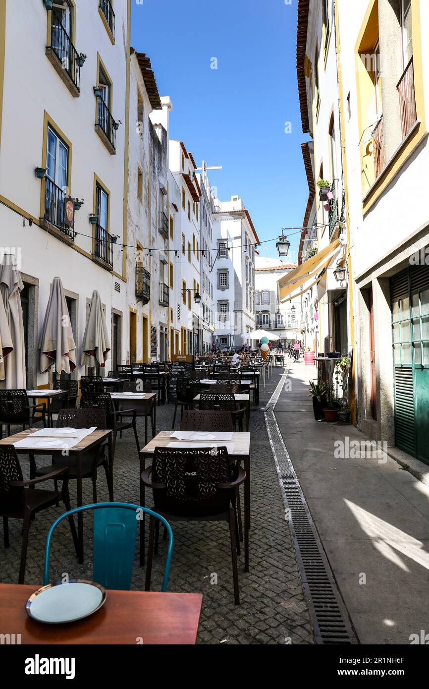 Evora, Portugal- October 10, 2022: Restaurants and terraces at night on ...