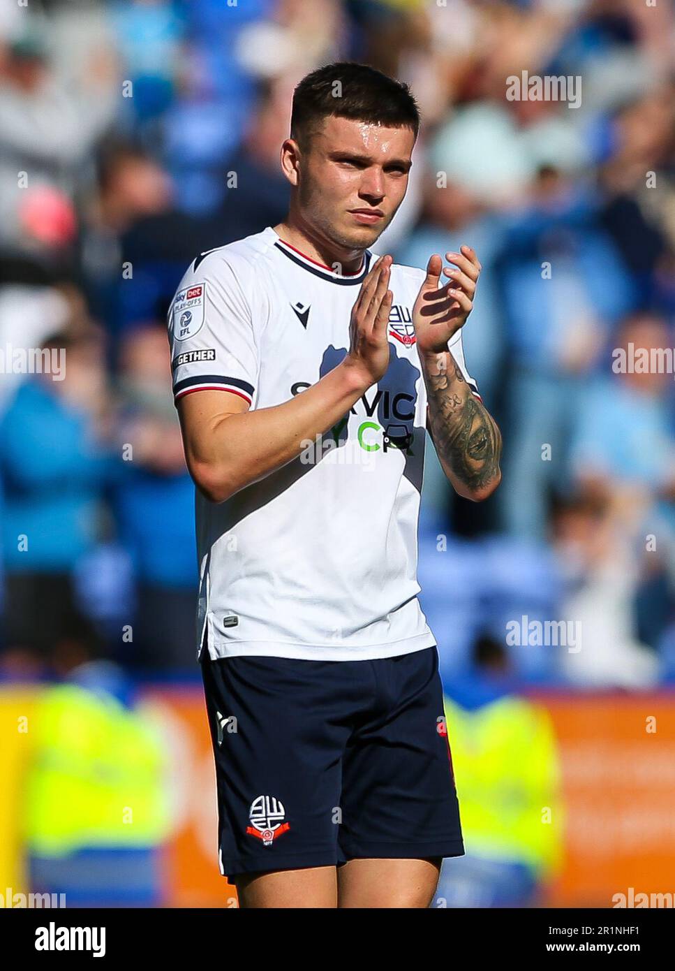 Bolton Wanderers' Aaron Morley applauds the fans after the final ...