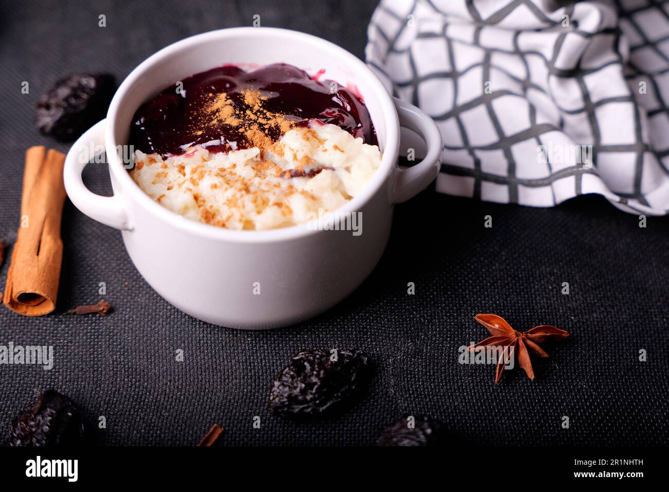 A typical Peruvian dessert with rice pudding and purple mazamorra Stock ...