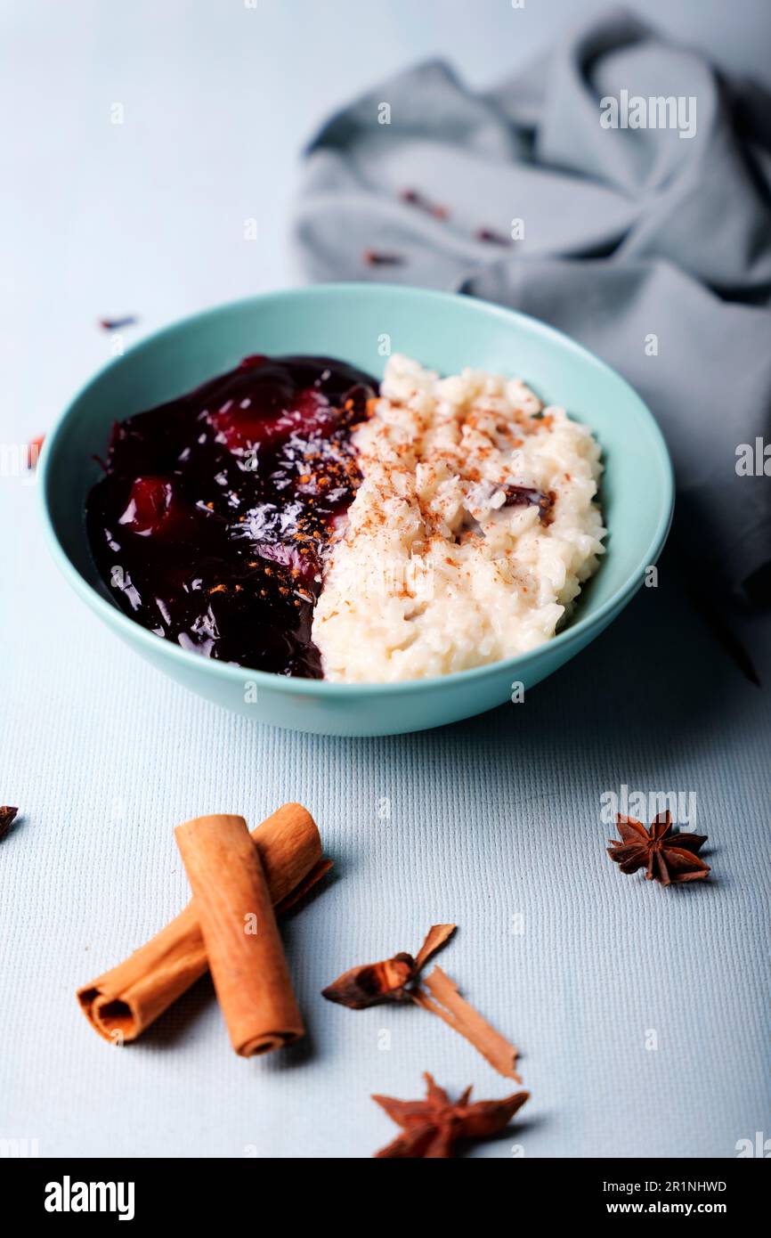 A typical Peruvian dessert with rice pudding and purple mazamorra Stock ...