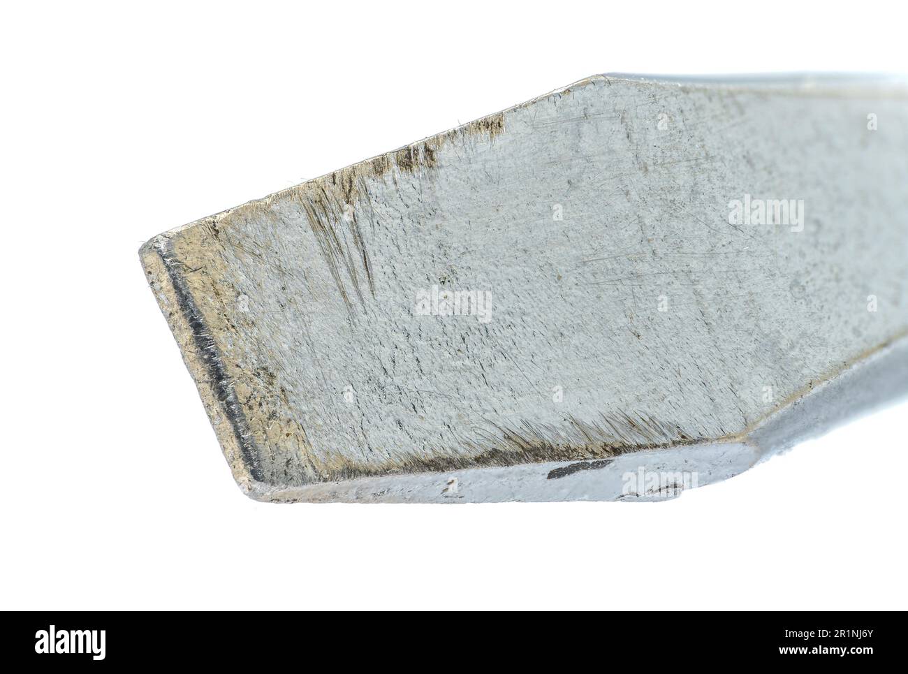 Standard flat-head screwdriver close up, macro on white background ...