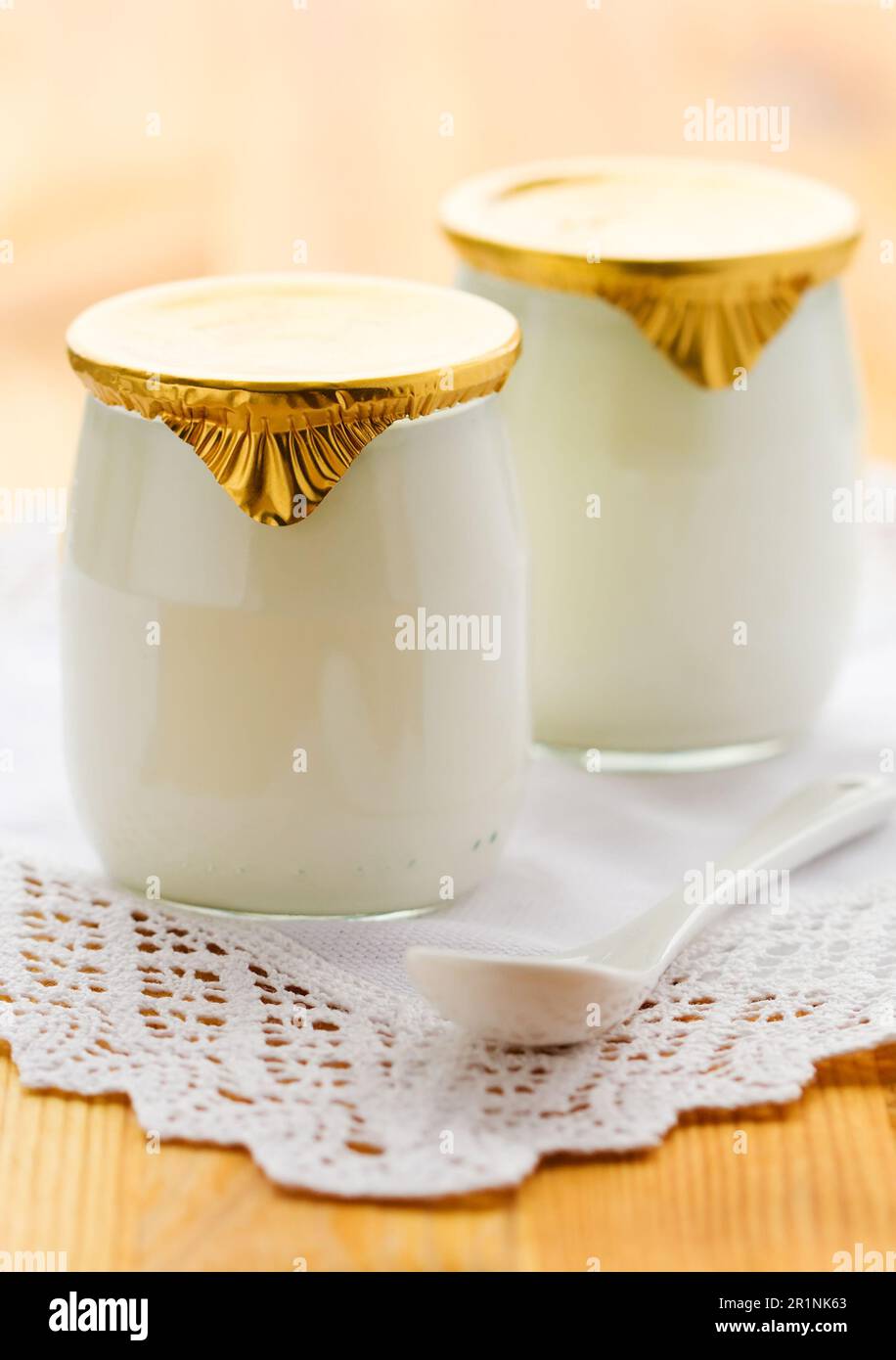 milk yogurt in a glass jar Stock Photo - Alamy