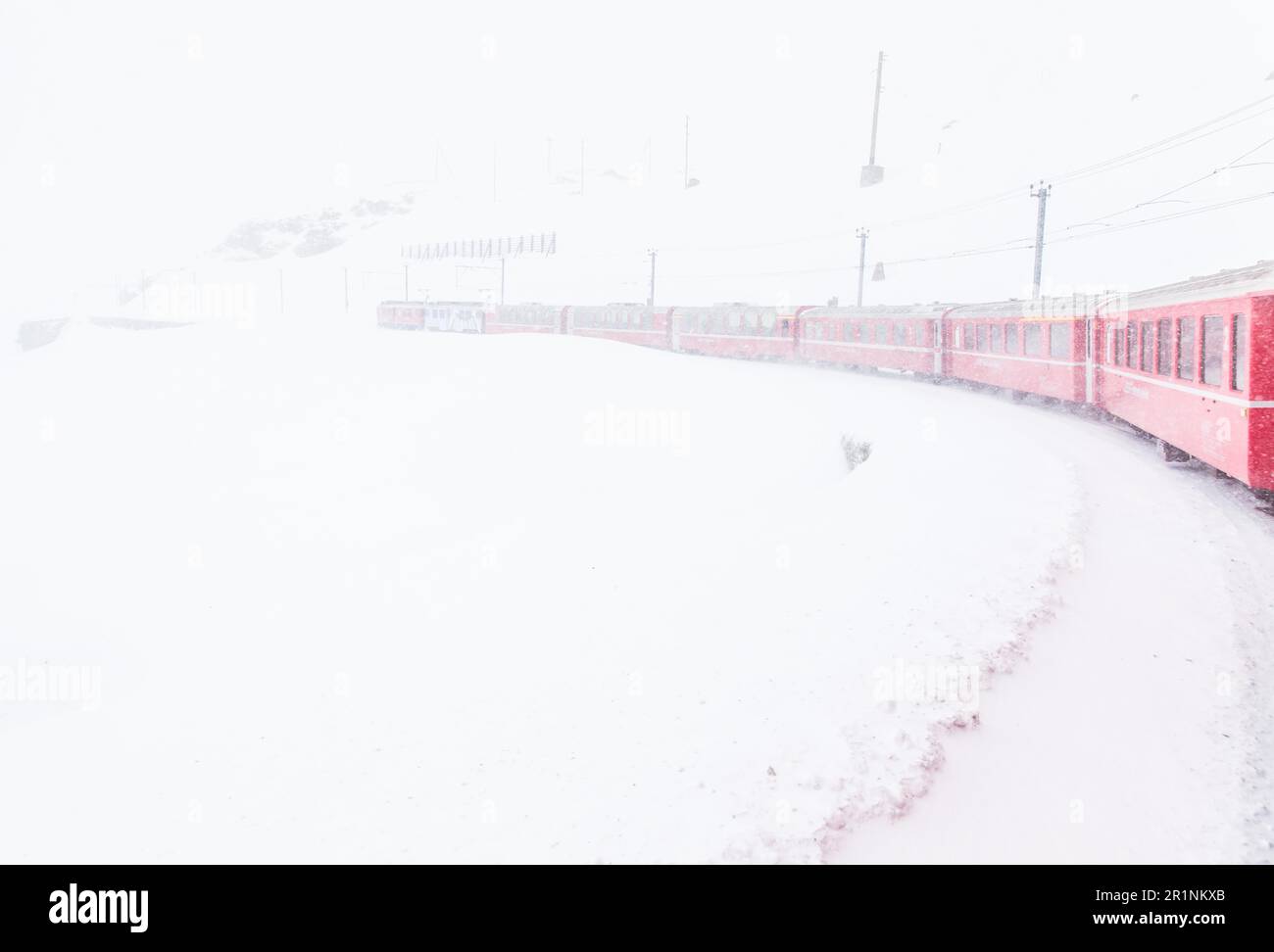 The famous Bernina red train, Unesco monument, in the middle of a ...