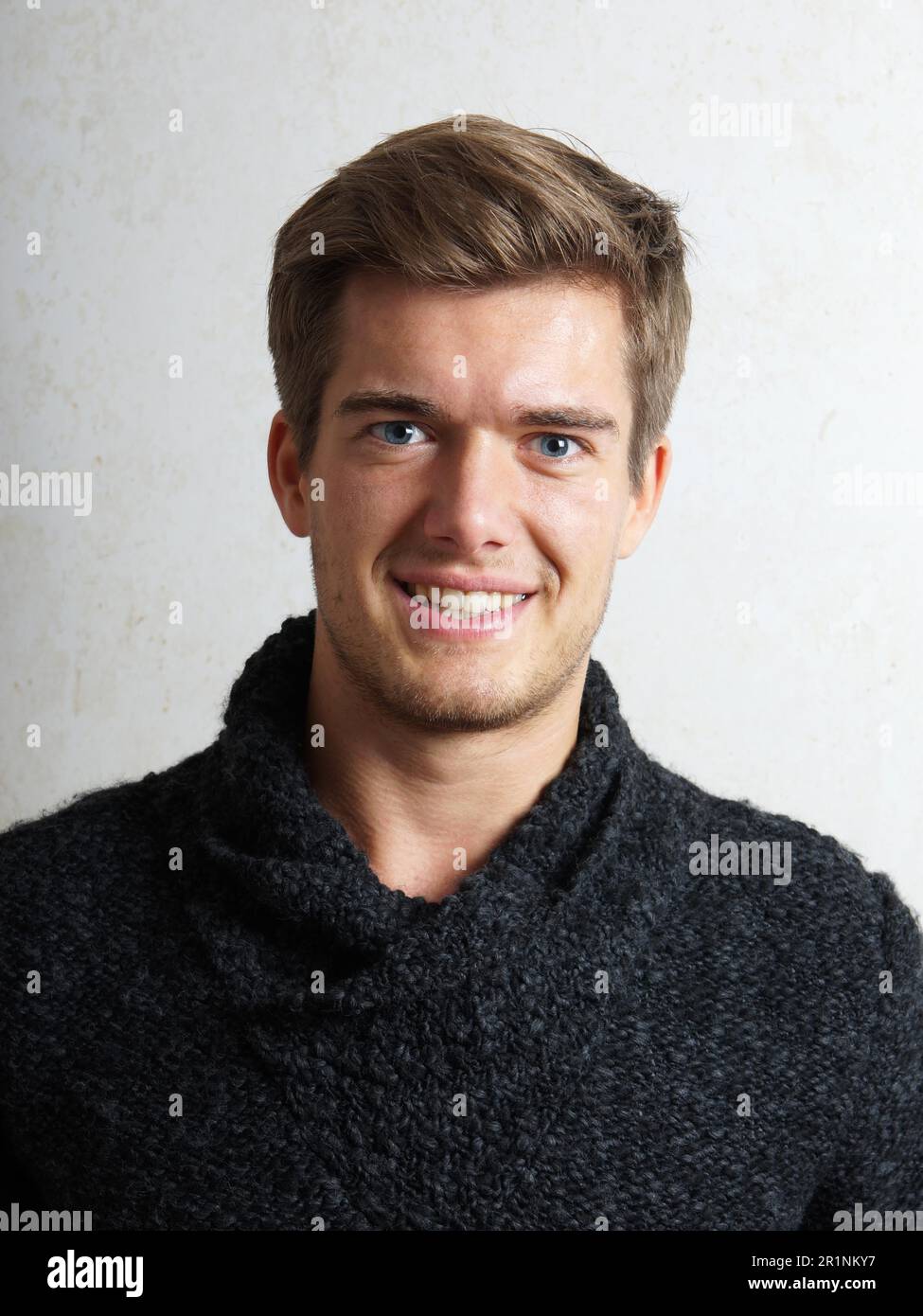 Happy smiling young unshaved man hi-res stock photography and images ...