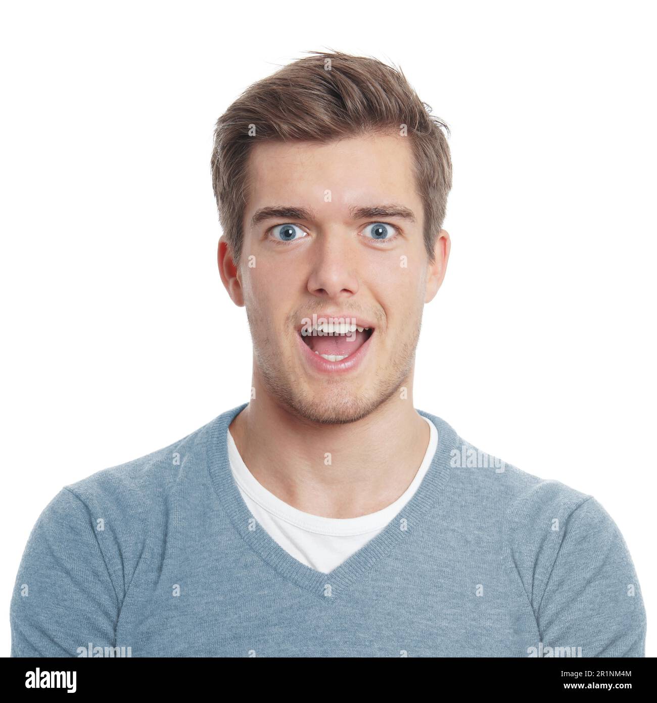 young man looking pleasantly surprised with open mouth Stock Photo - Alamy