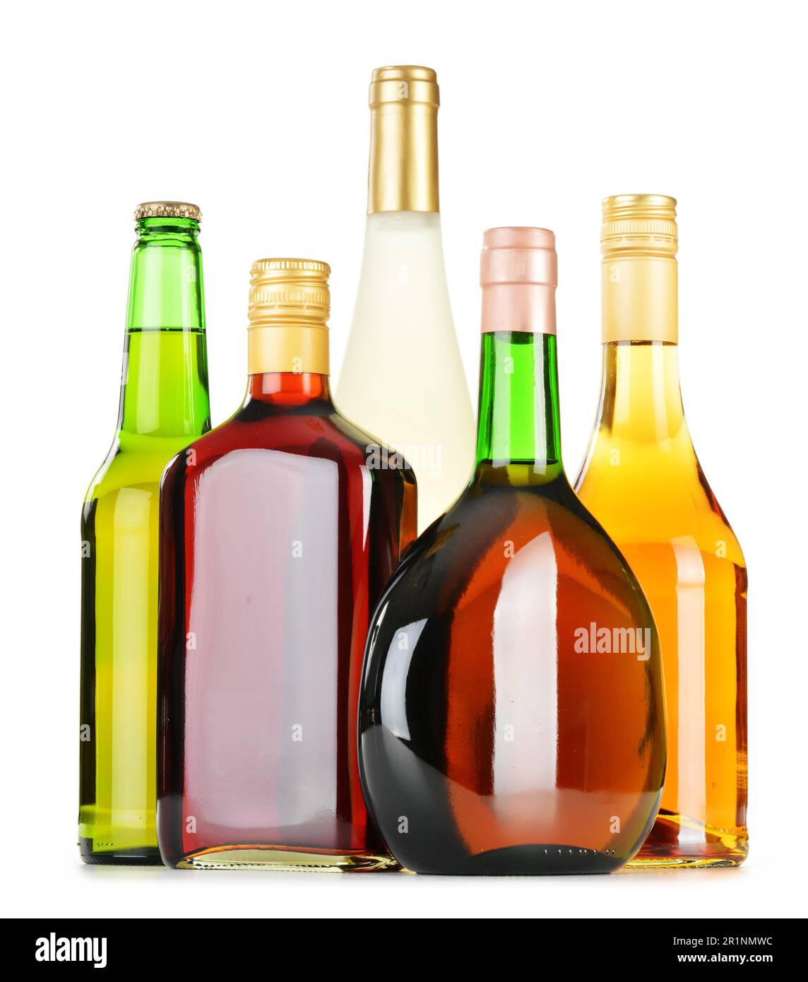 Bottles of assorted alcoholic beverages isolated on white background ...