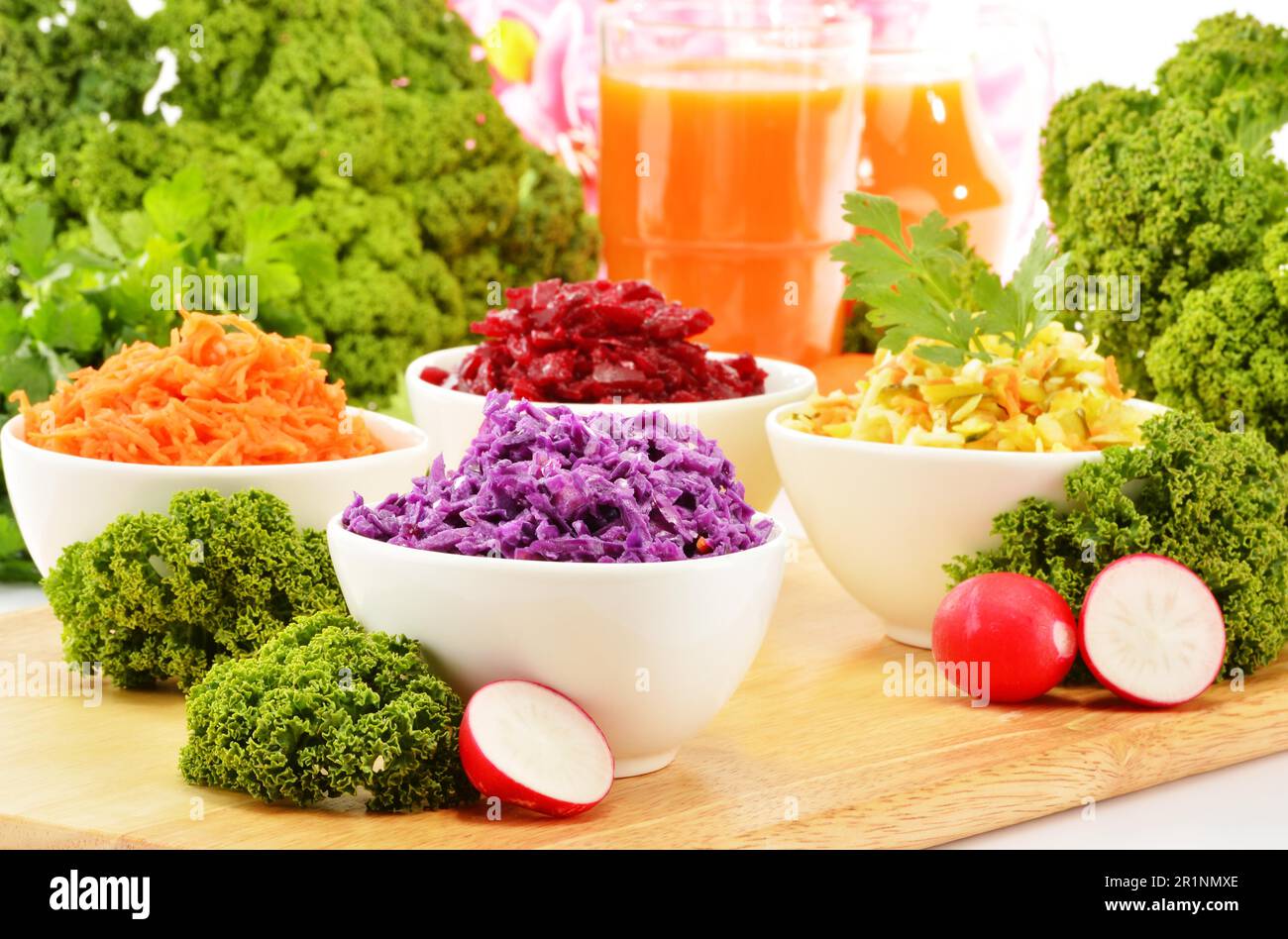 Composition with four vegetable salad bowls Stock Photo - Alamy