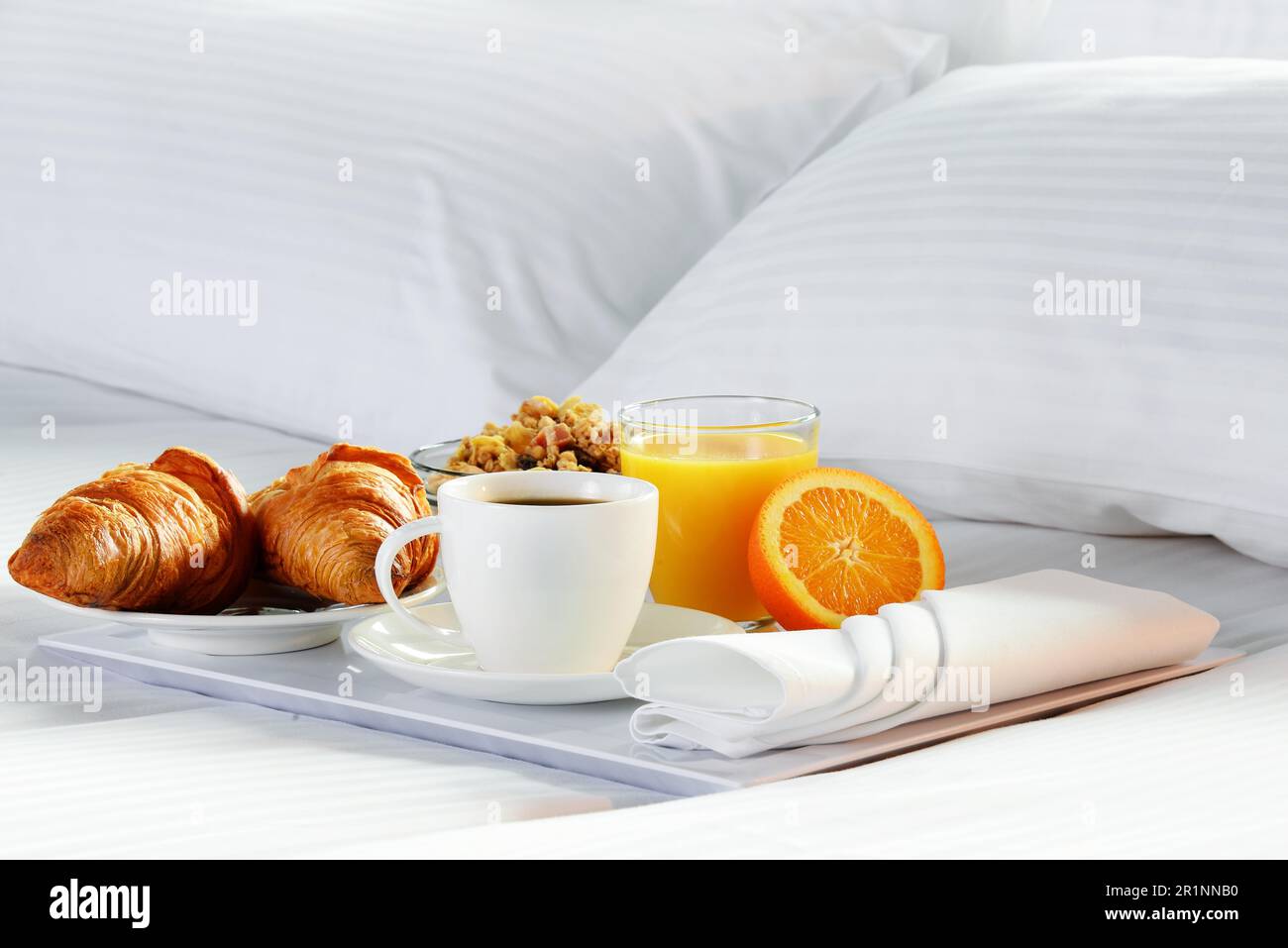 Breakfast in bed in hotel room. Accommodation Stock Photo - Alamy