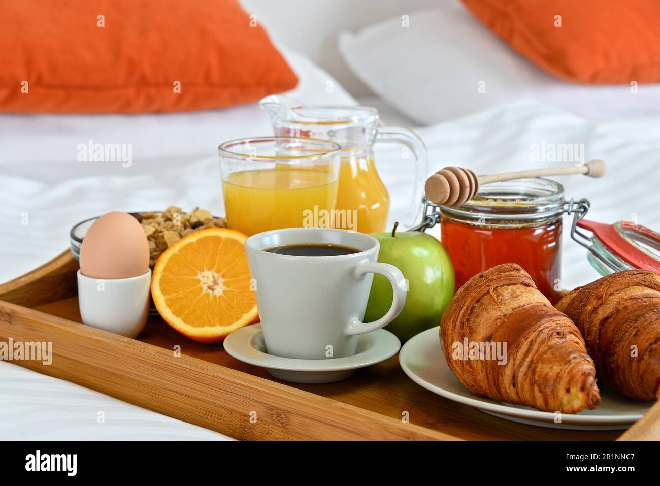 Breakfast in bed in hotel room. Accommodation Stock Photo - Alamy