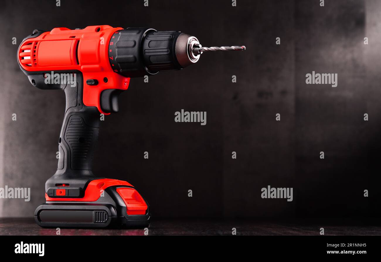 Cordless drill with drill bit working also as screw gun Stock Photo - Alamy