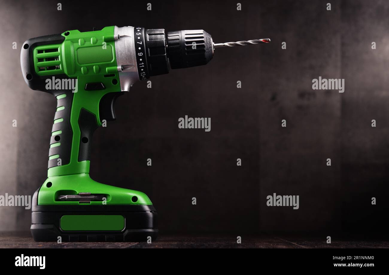 Cordless drill with drill bit working also as screw gun Stock Photo - Alamy