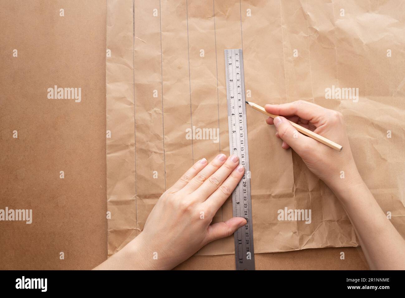 measure the package and divide it into strips, making segments, step by ...