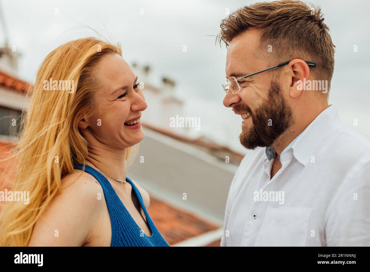 Couple Smile at Each Other Stock Photo - Alamy
