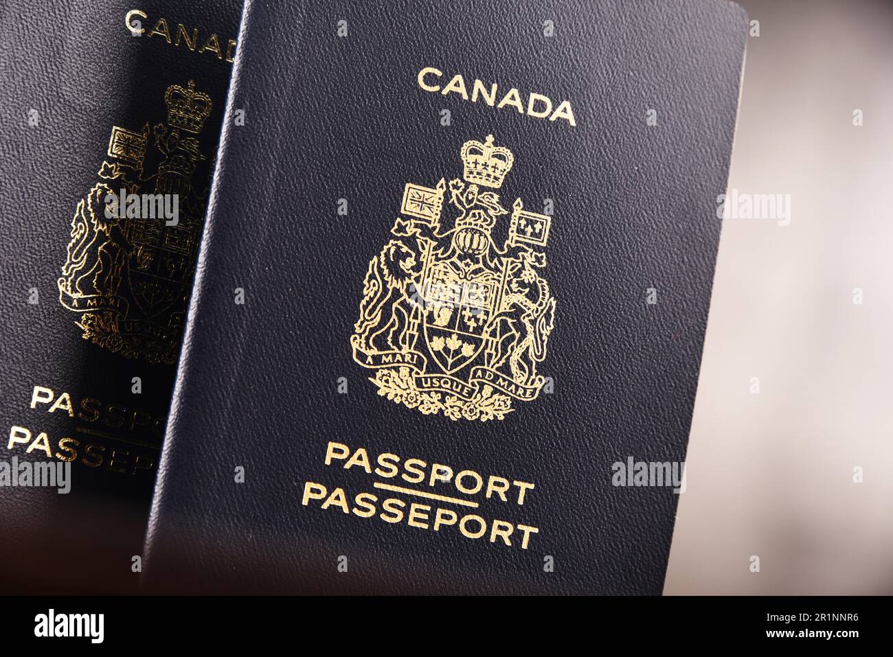 Composition with two Canadian passports Stock Photo - Alamy