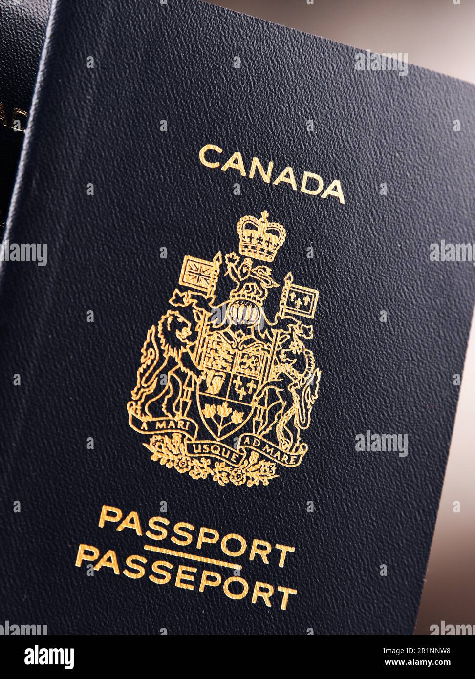 Composition with two Canadian passports Stock Photo - Alamy