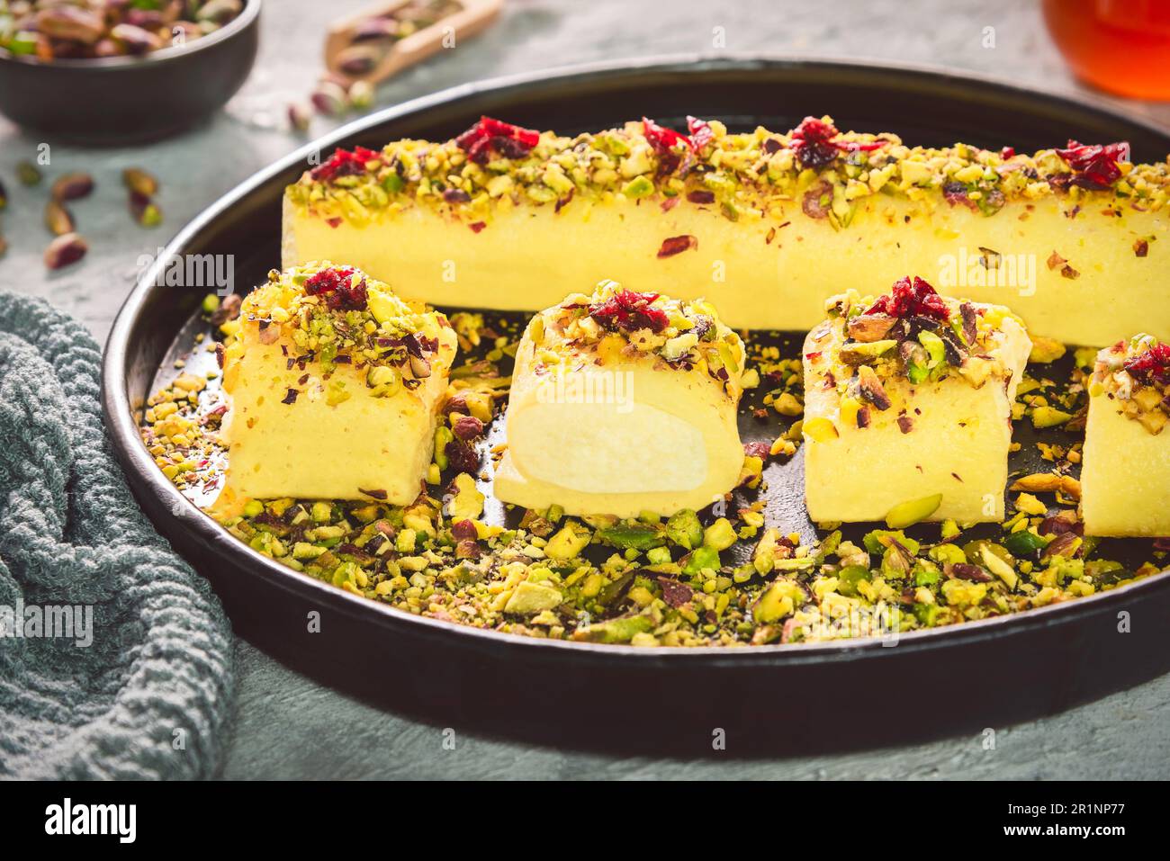 Middle Eastern traditional sweet cheese rolls " Halawet El Jebin". A ...