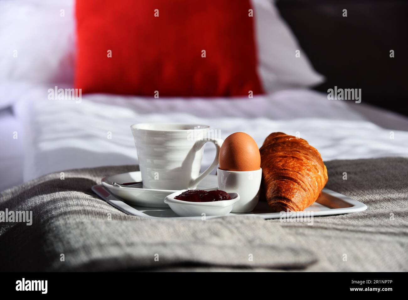 Breakfast on tray in bed in hotel room Stock Photo - Alamy