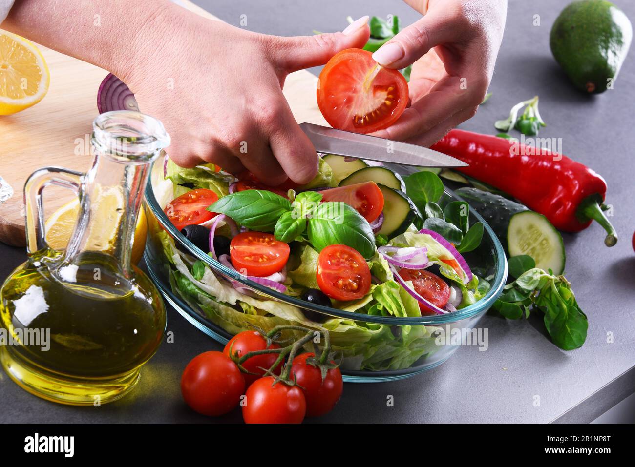 Preparation salad from tomato hi-res stock photography and images - Alamy