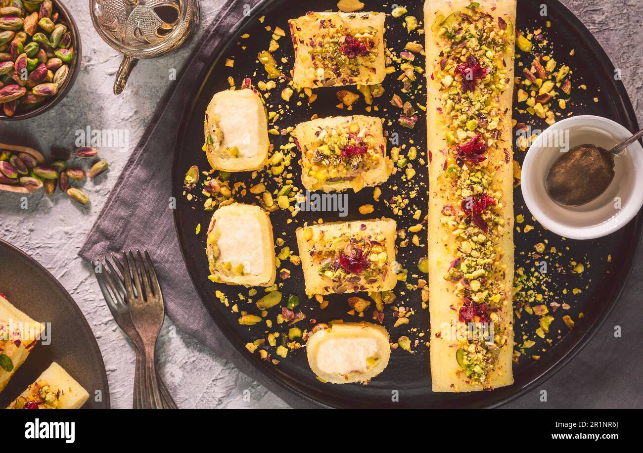Middle Eastern traditional sweet cheese rolls " Halawet El Jebin". A ...