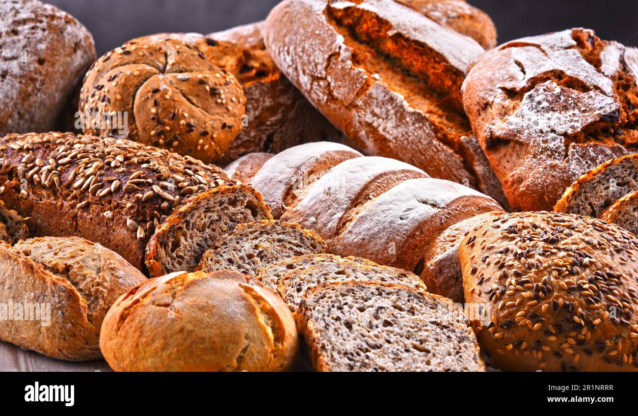Composition with assorted bakery products including loafs of bread and ...