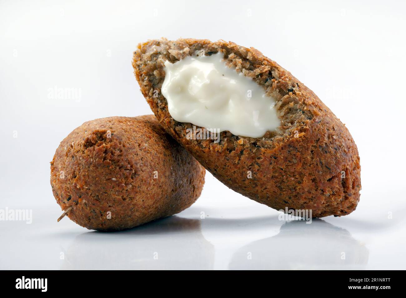 Fried kibbeh stuffed with cream cheese, Brazilian snack Stock Photo - Alamy