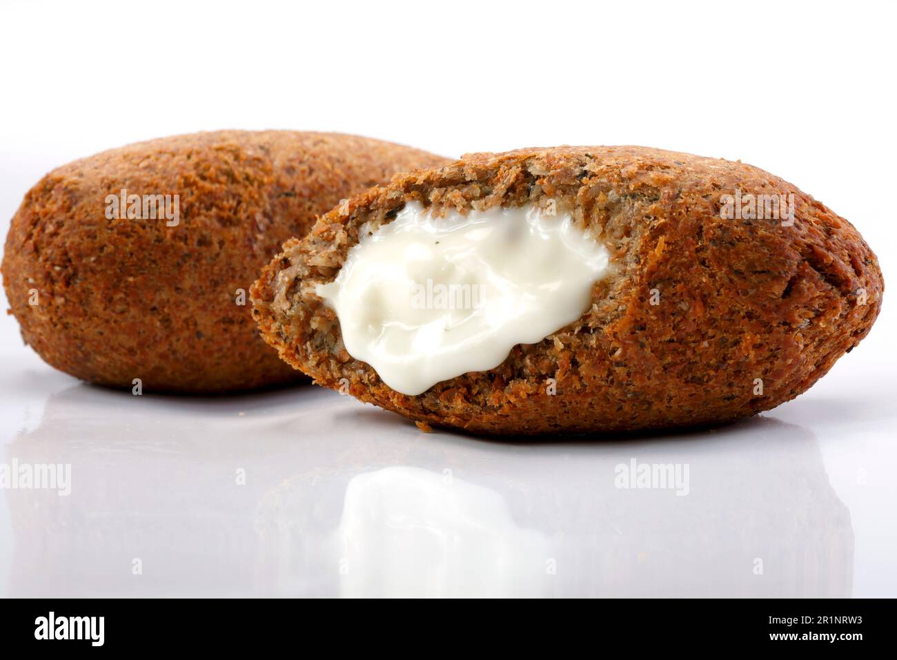 Fried kibbeh stuffed with cream cheese, Brazilian snack Stock Photo - Alamy