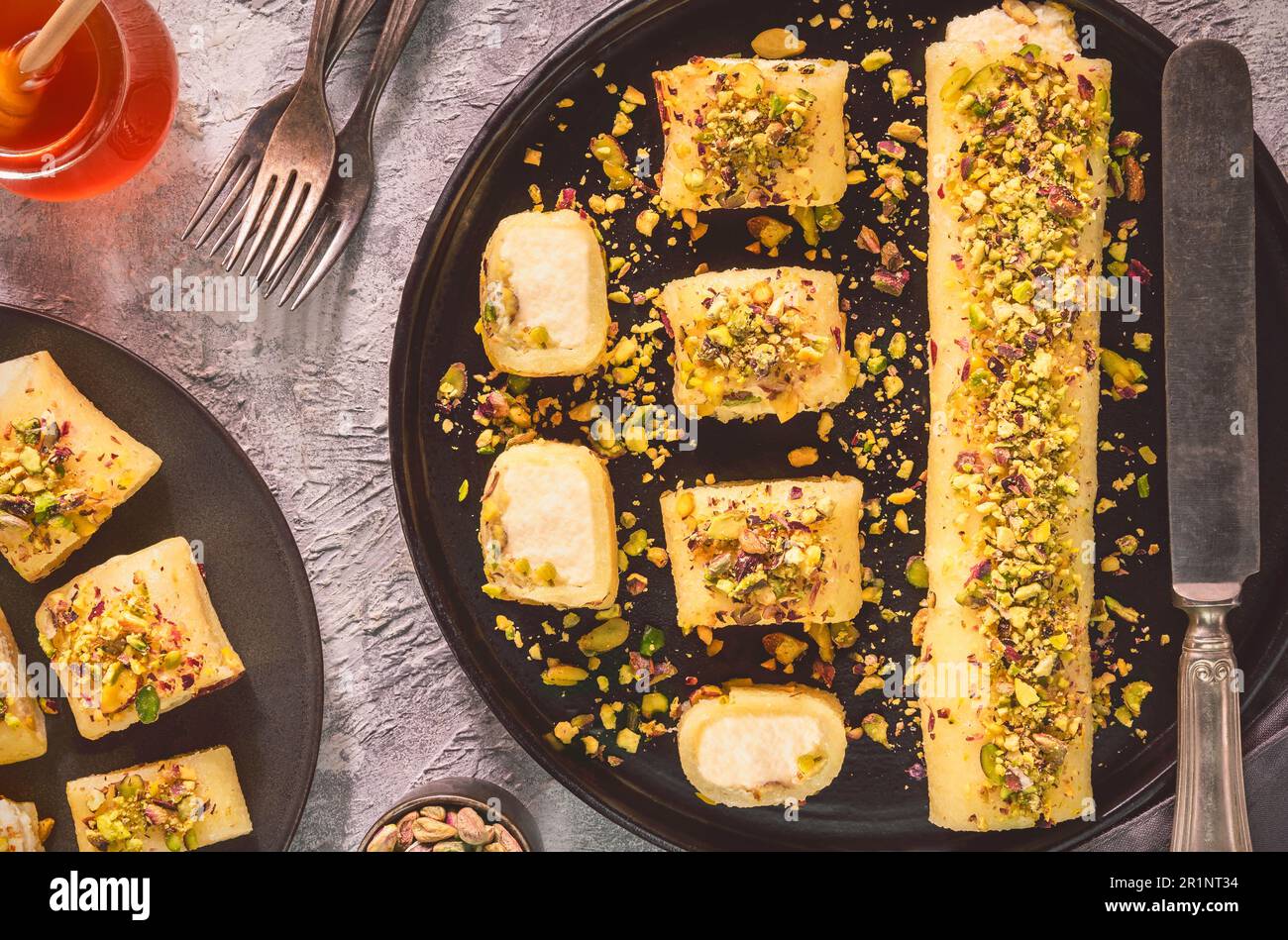 Middle Eastern traditional sweet cheese rolls " Halawet El Jebin". A ...