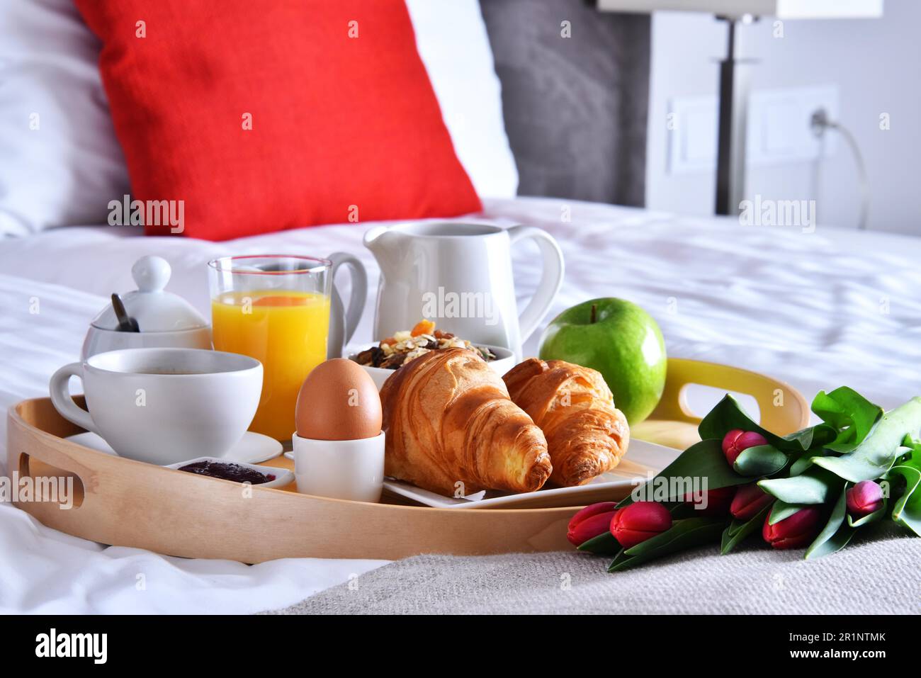 Breakfast on tray in bed in hotel room Stock Photo - Alamy