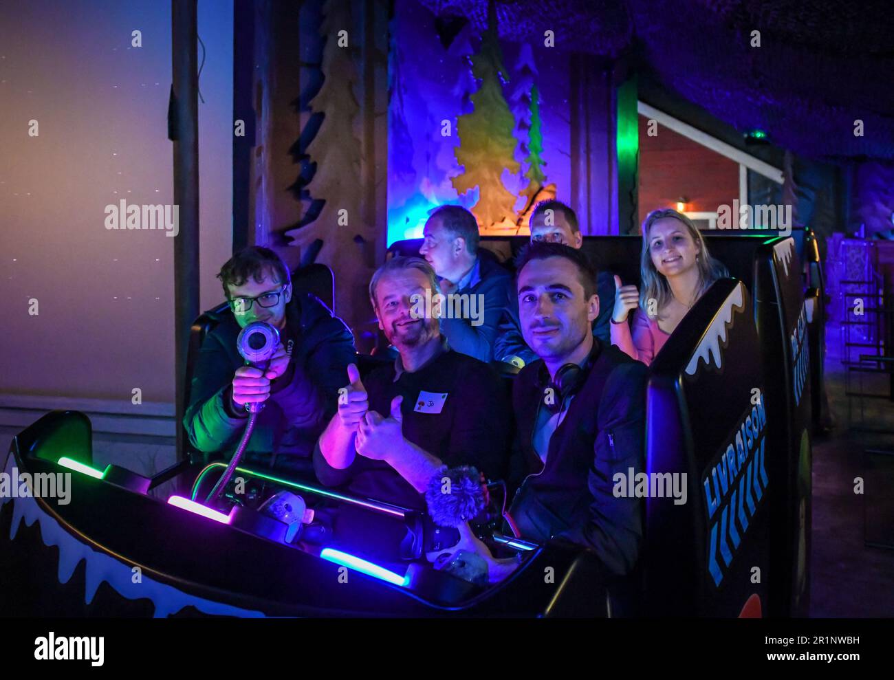 People try out the "Champi'folies' dark ride at Le Pal in France Stock ...