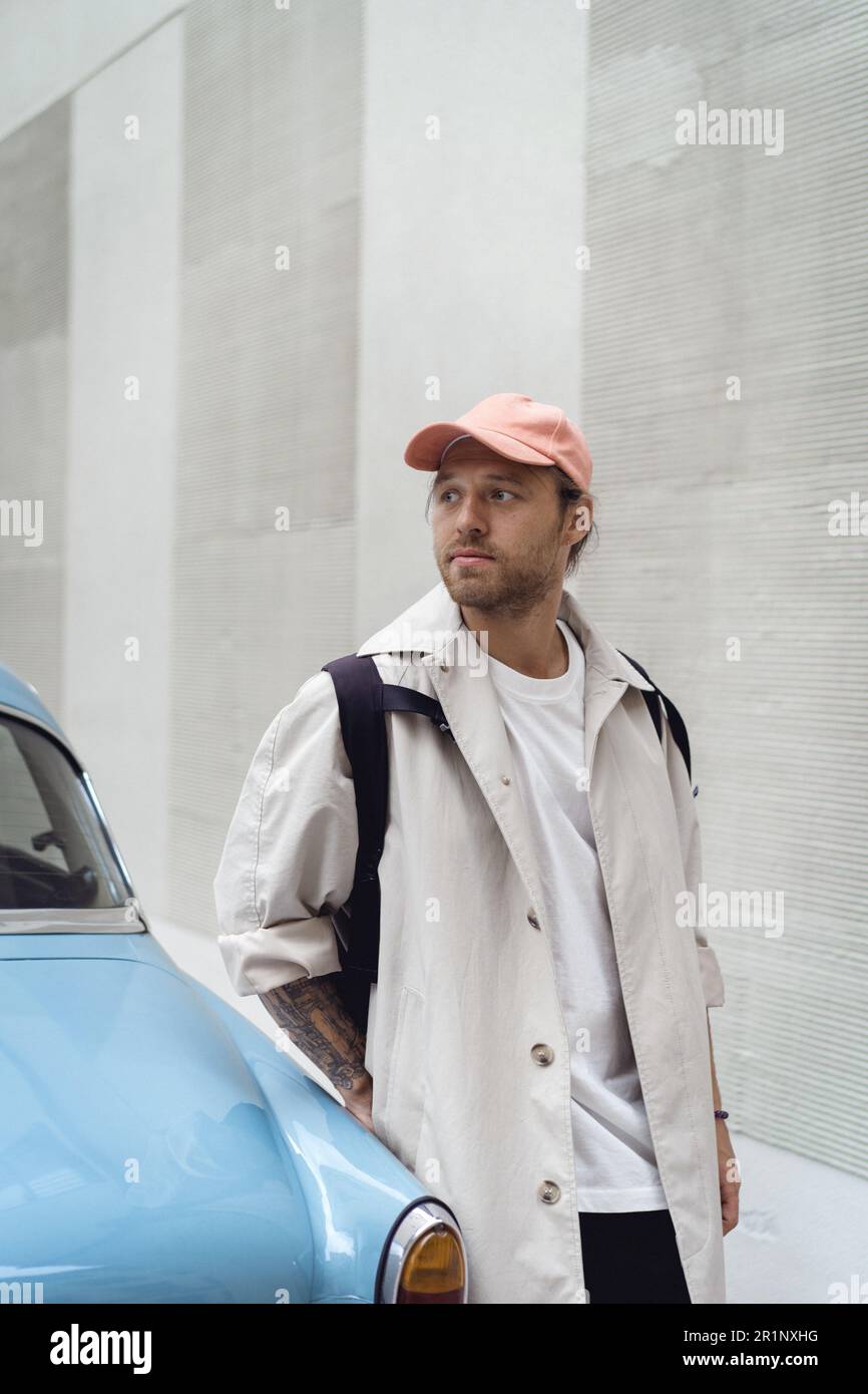 Young man in a retro car. 121 Volvo Stock Photo - Alamy