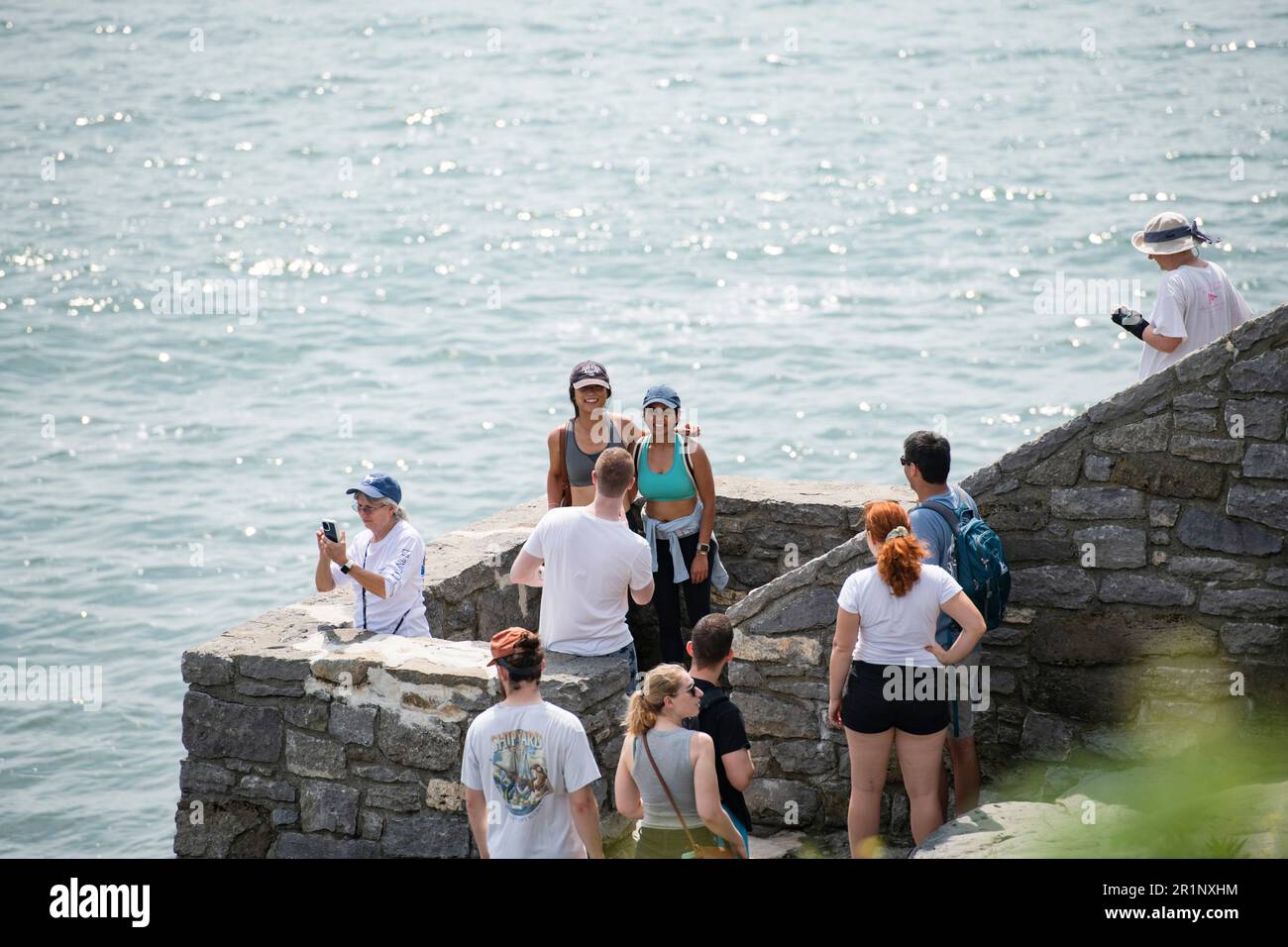 Tourists enjoying Forty Steps at Newport Cliff Walk in summer Stock ...