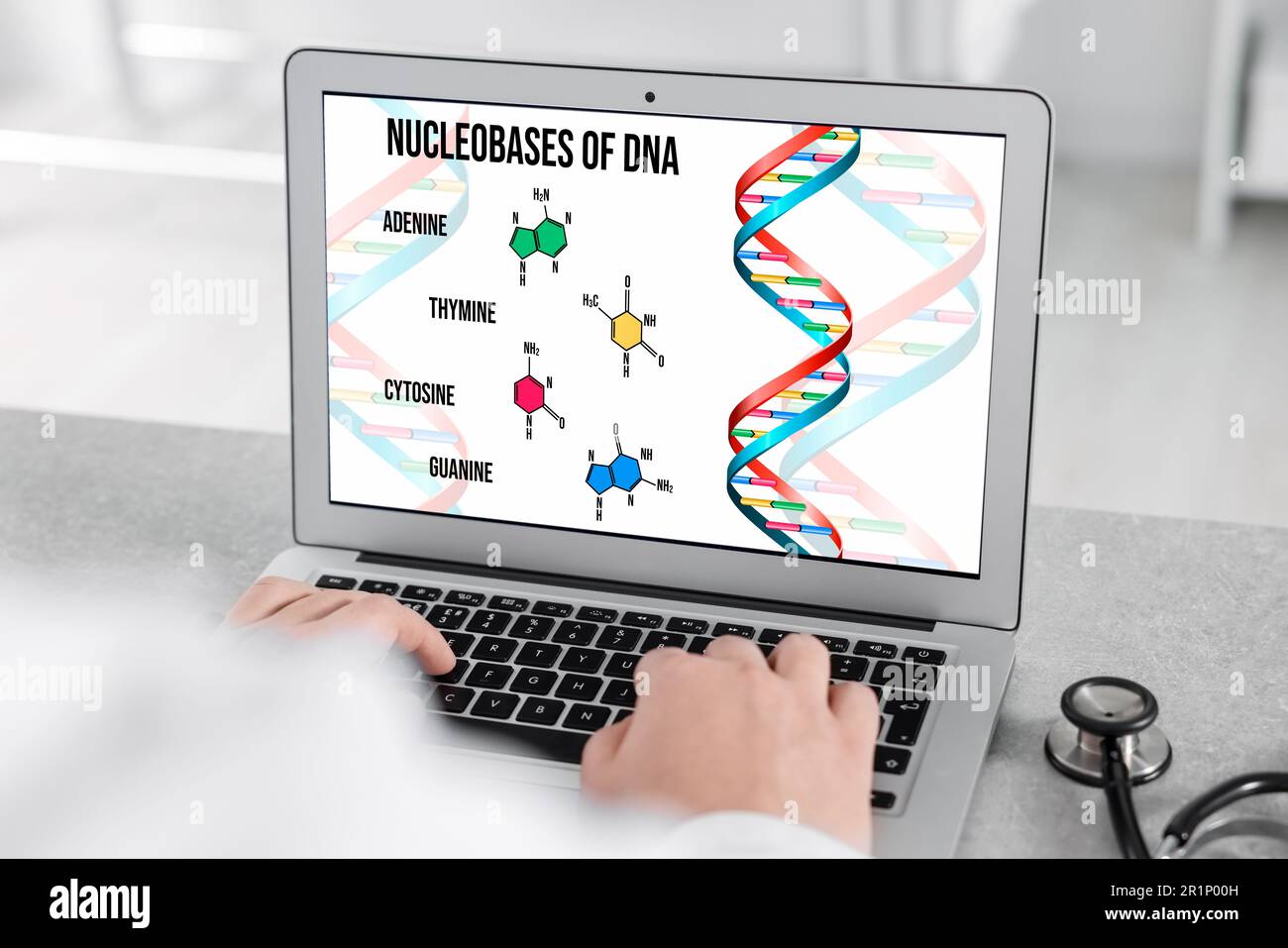 Male scientist using laptop dna hi-res stock photography and images - Alamy