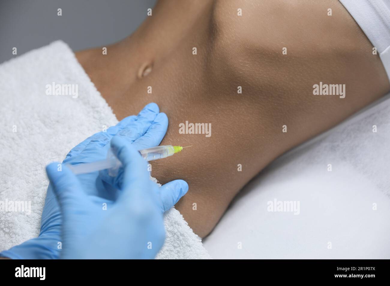 Syringe doctor belly hi-res stock photography and images - Alamy