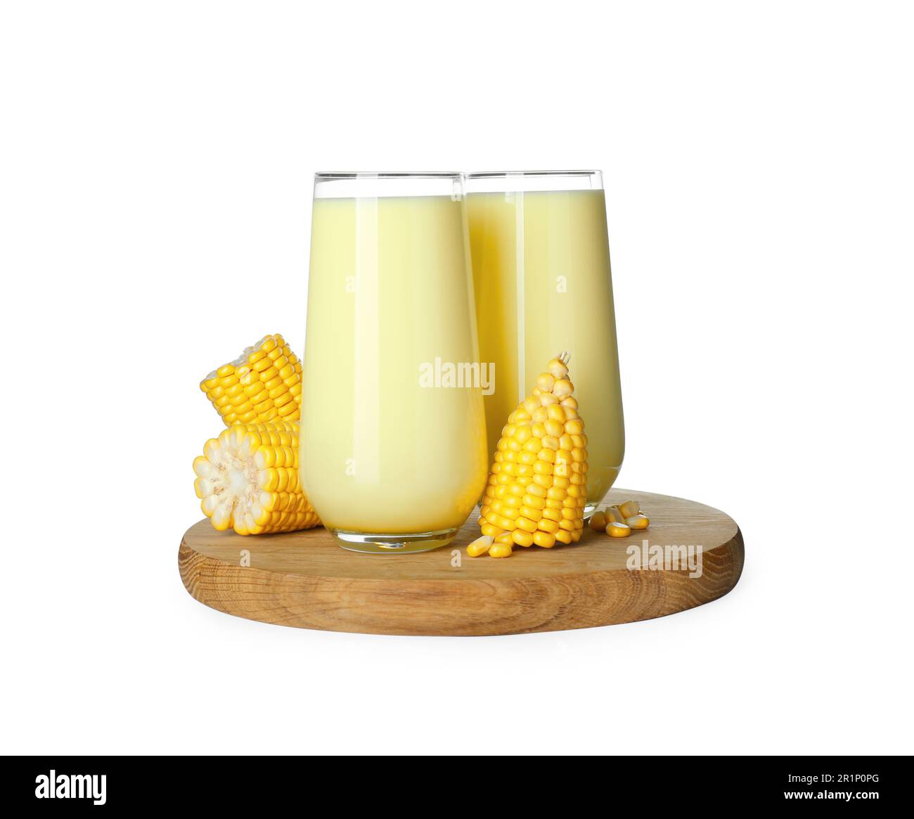 Tasty fresh corn milk in glasses and cobs on white background Stock ...