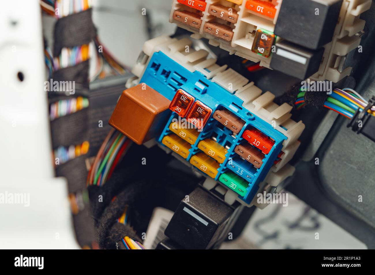 Electric wiring system with colorful wires in the car Stock Photo - Alamy