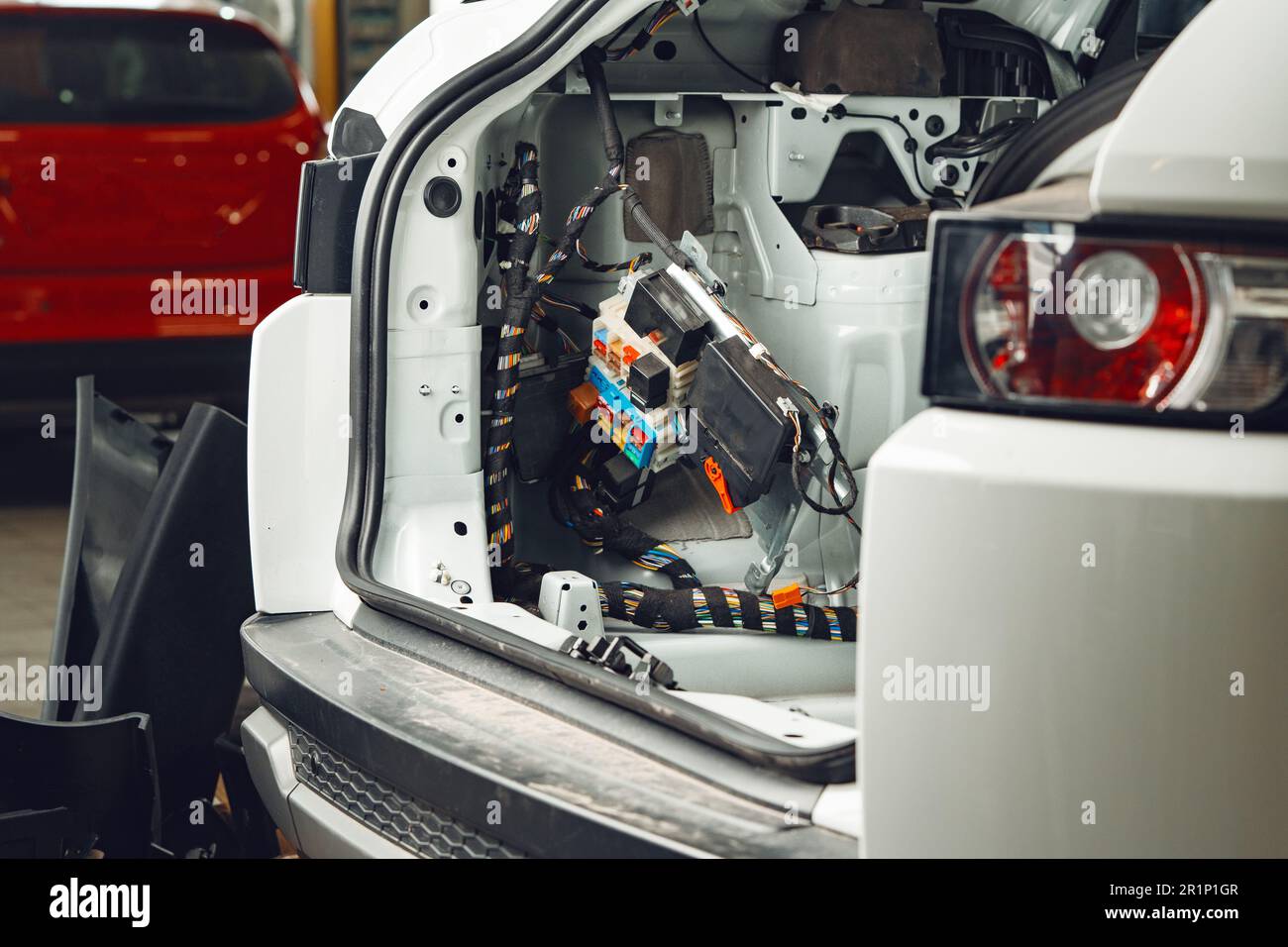 Electric wiring system with colorful wires in the car Stock Photo - Alamy