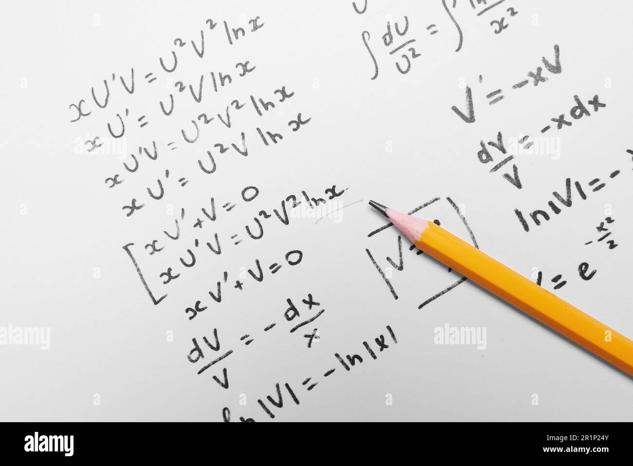Sheet of paper with mathematical formulas and pencil, top view Stock ...