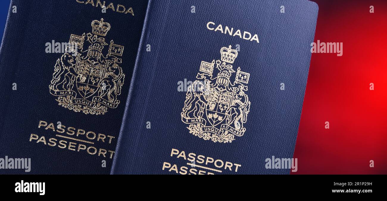 Composition with two Canadian passports Stock Photo - Alamy