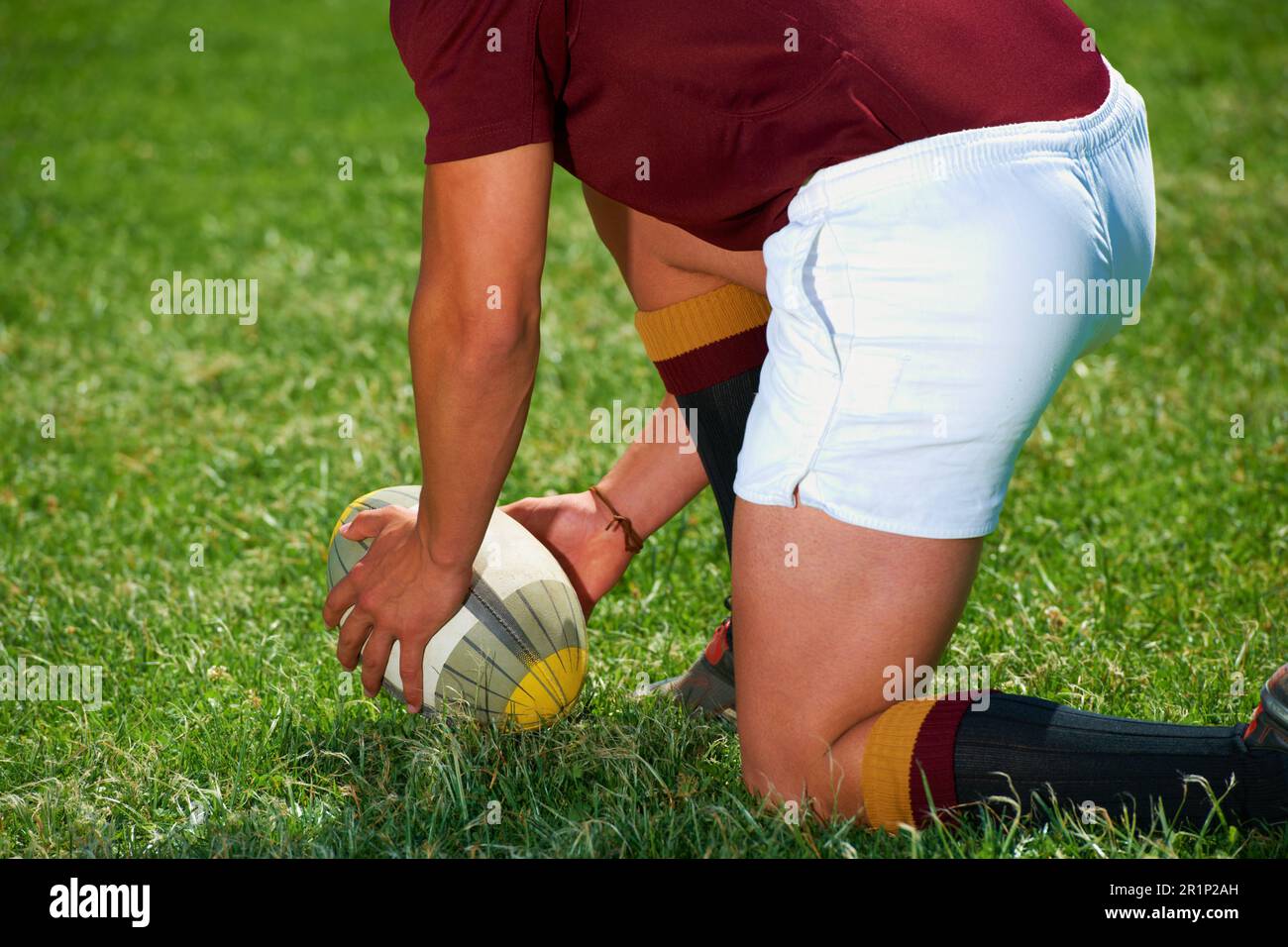 Rugby ball kick hands hi-res stock photography and images - Alamy