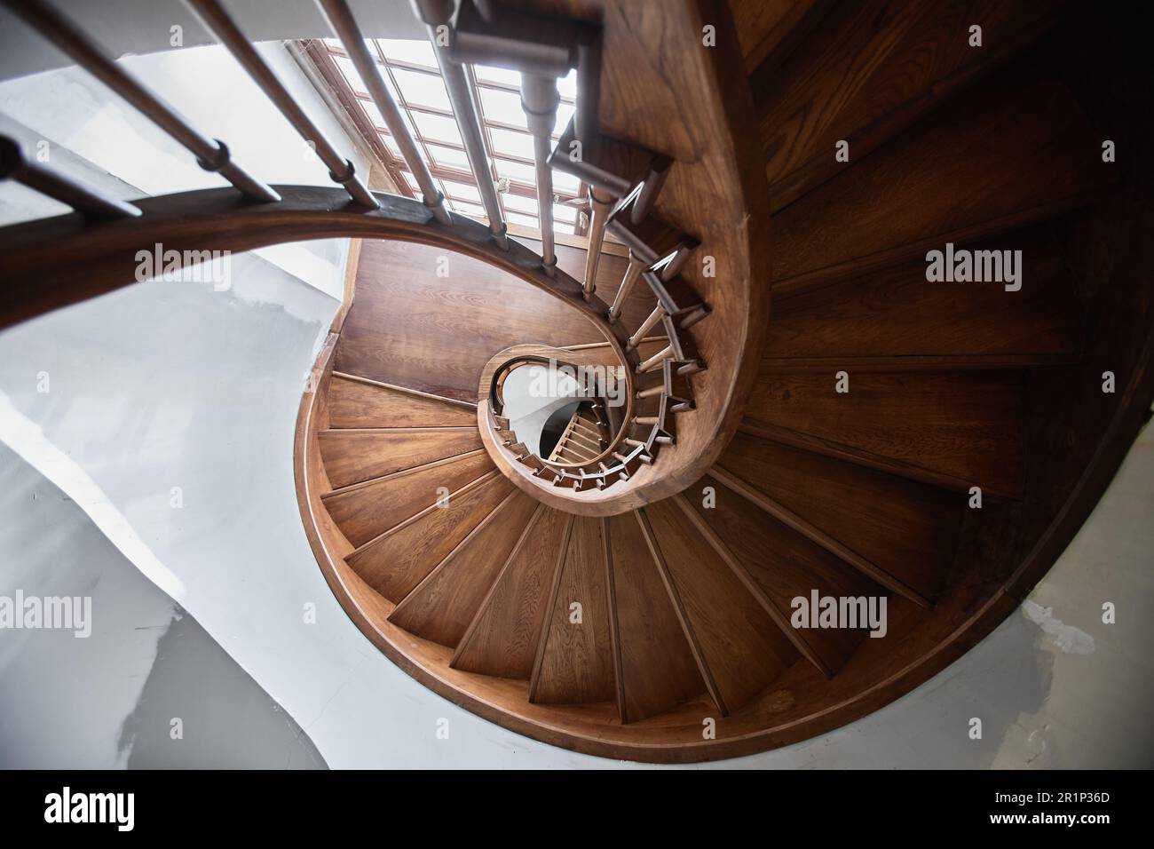 Top view of wooden spiral staircase in old church Stock Photo - Alamy