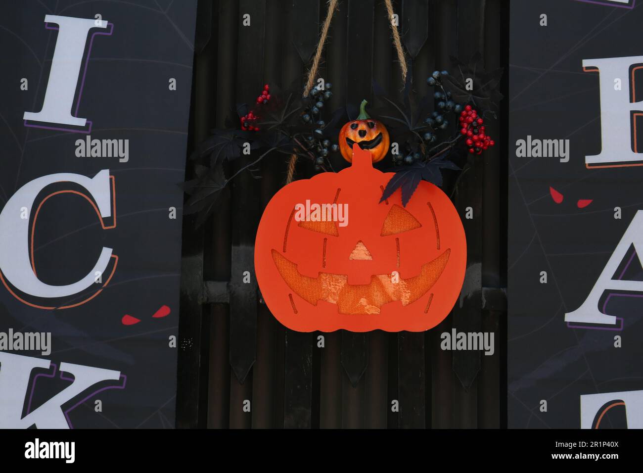 Cute Halloween decor with paper Jack O'Lantern on window, view from ...