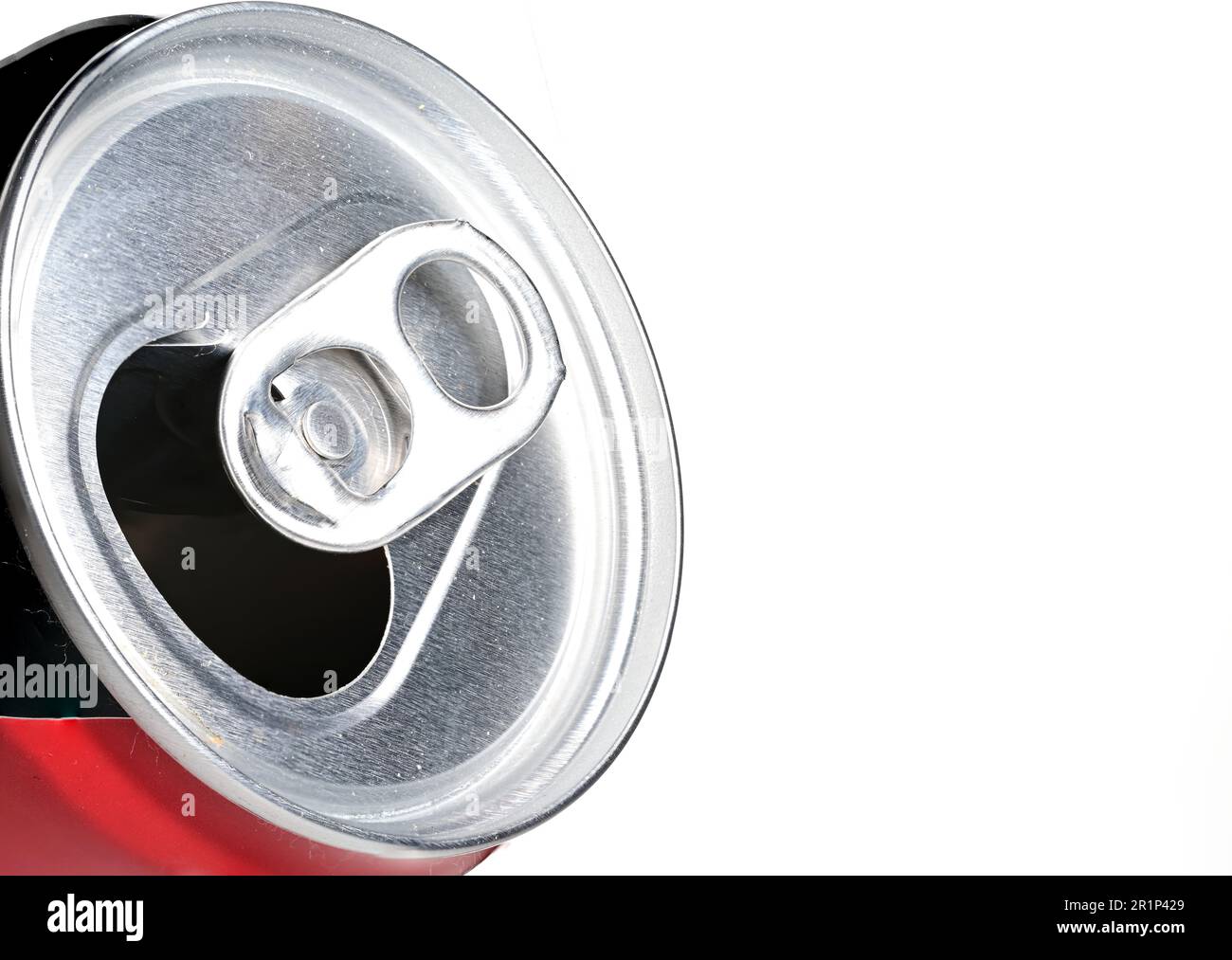 Partial side view close up of silver aluminum beverage can with open ...