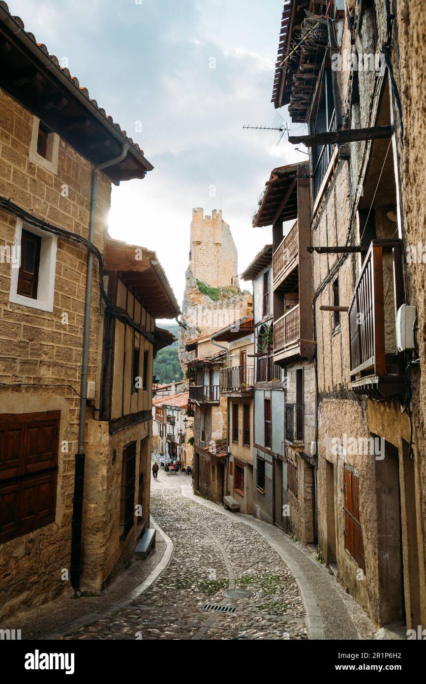 Street of Frias with the castle at the background, in the region of ...